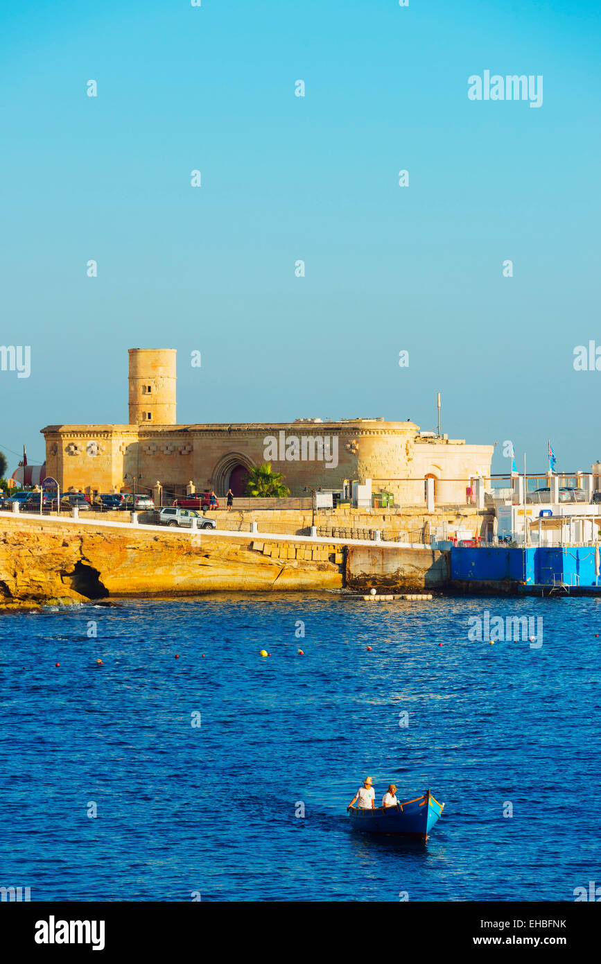 Sliema waterfront watchtower sea boat hi-res stock photography and ...