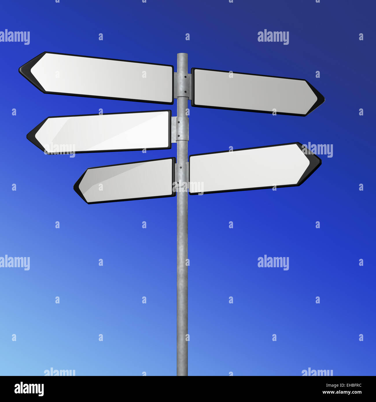 white directional sign on blue sky Stock Photo - Alamy