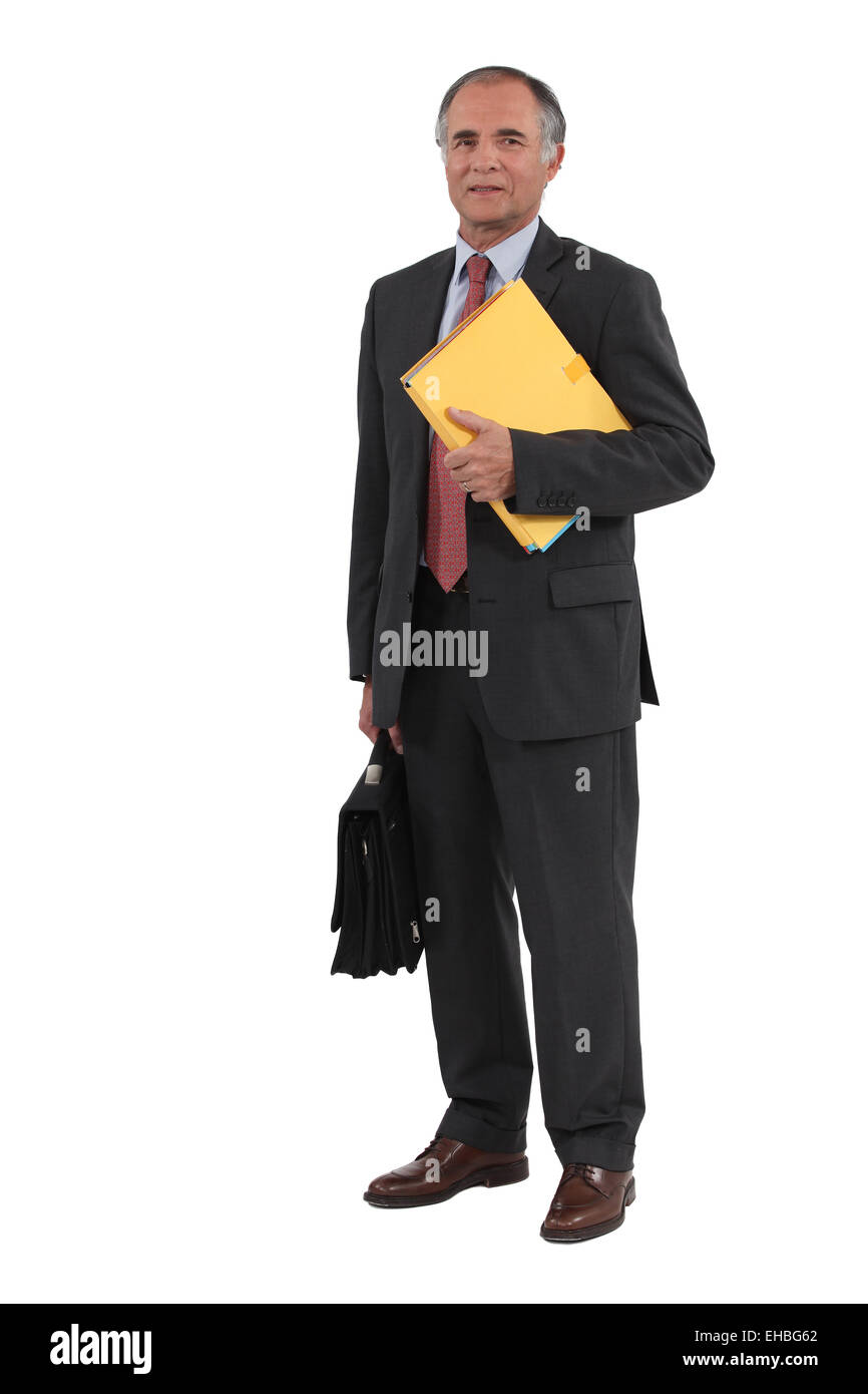 Businessman holding folders Stock Photo - Alamy Businessman holding folders Stock Photo - Alamy