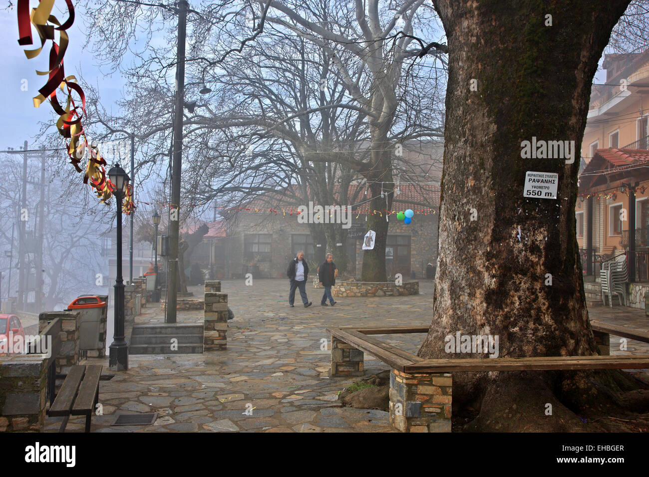 At the square of Rapsani village (famous for its wines) on the slopes ...