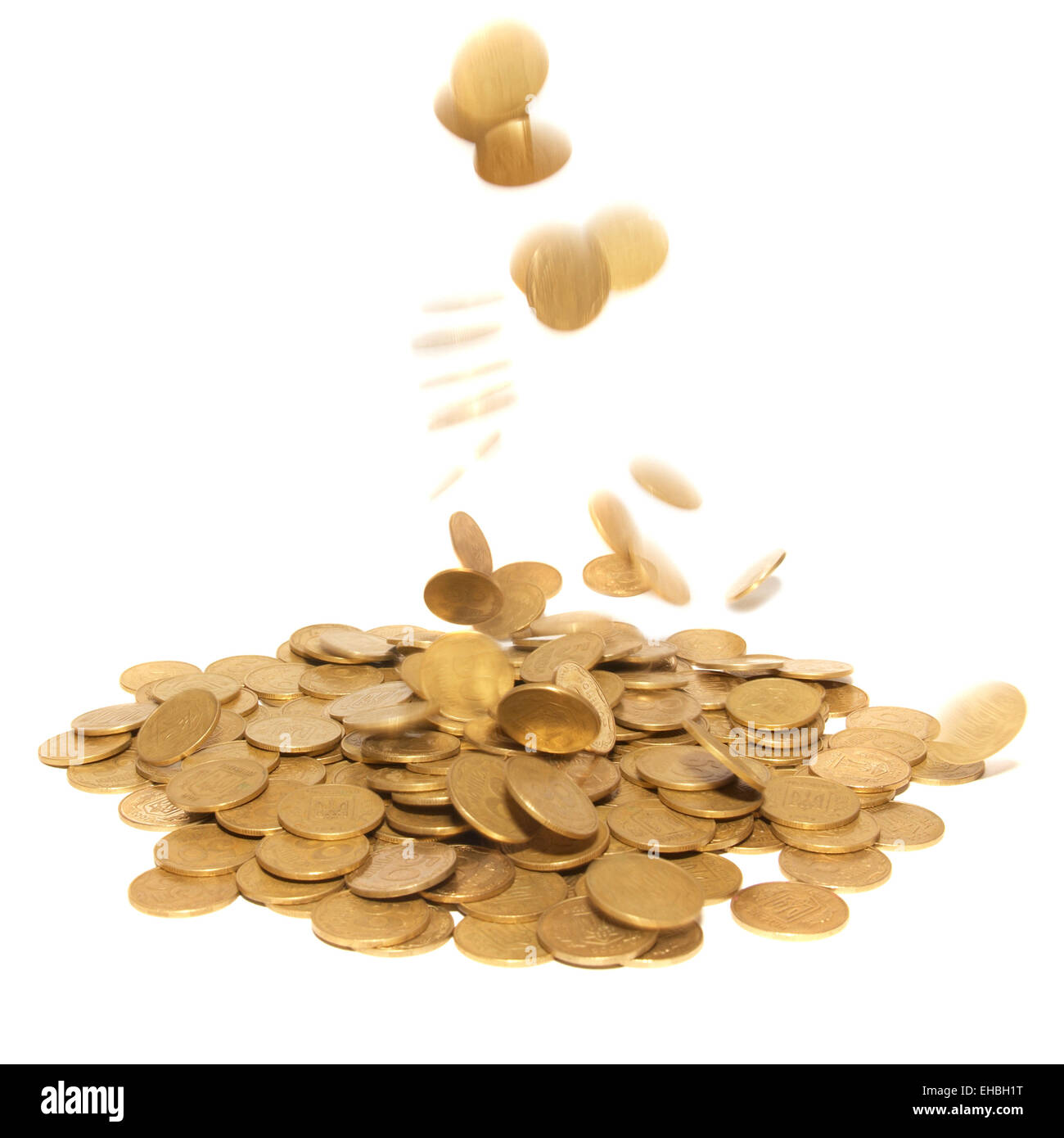 Rain of golden coins isolated on white Stock Photo - Alamy