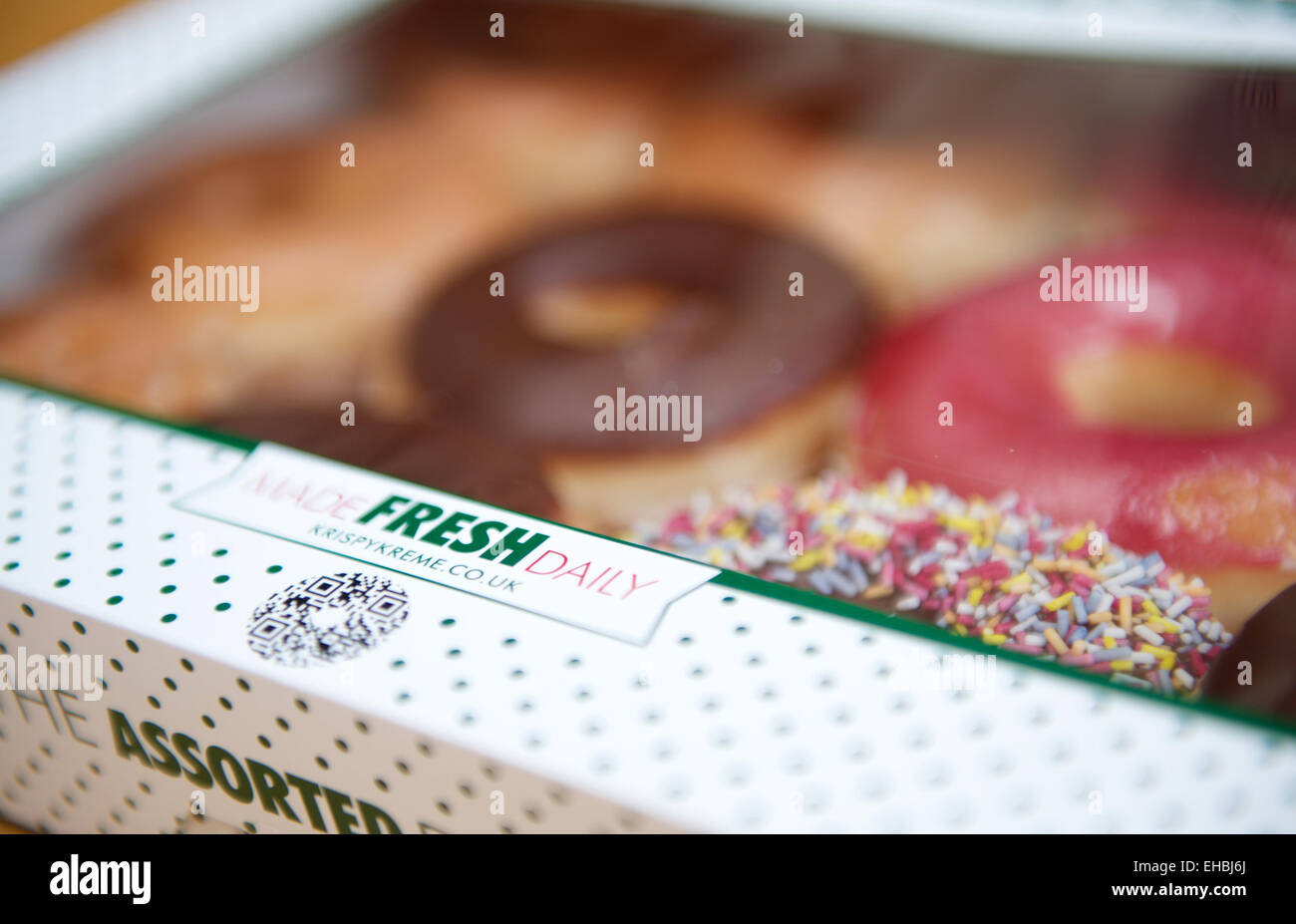 Krispy Kreme doughnuts box treats desserts Stock Photo - Alamy
