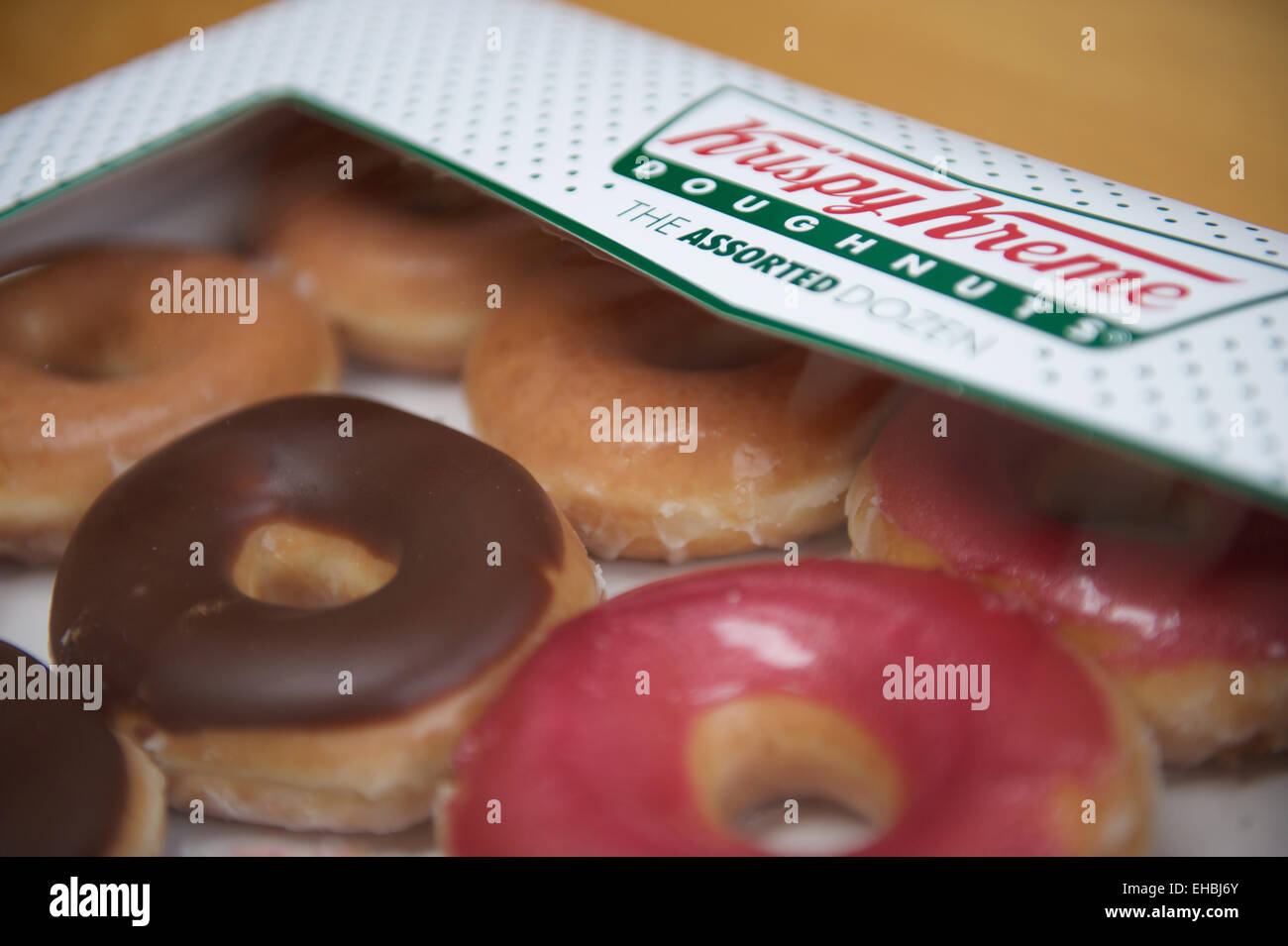 Krispy Kreme doughnuts box treats desserts Stock Photo - Alamy