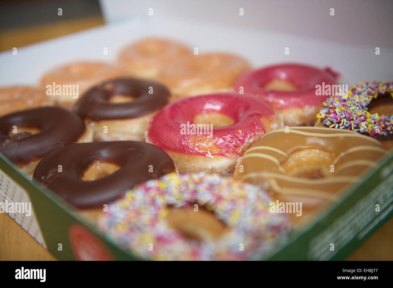 Krispy Kreme doughnuts box treats desserts Stock Photo - Alamy