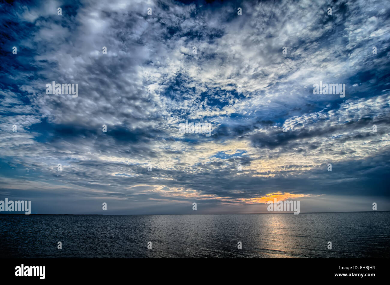 sunset at the beach Stock Photo - Alamy