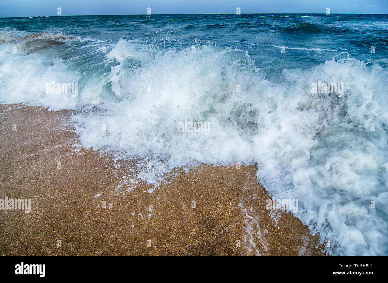 seascape with waves and sand beach Stock Photo - Alamy