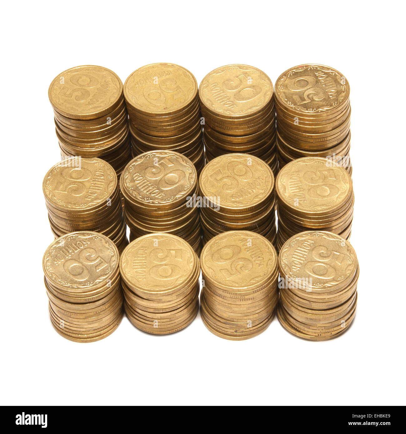 Stack of golden coins isolated on white Stock Photo - Alamy