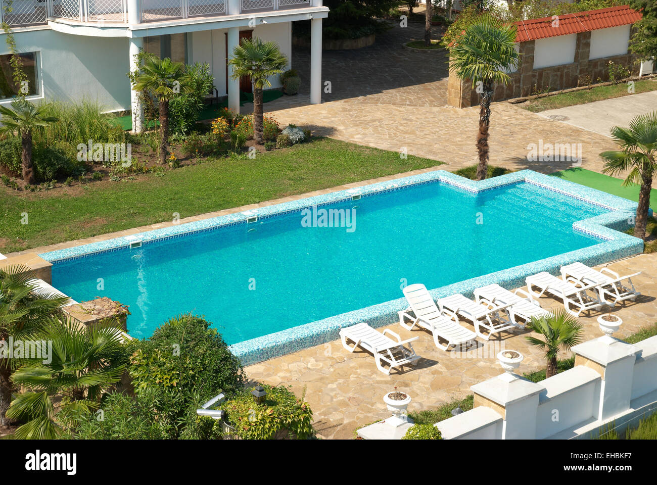House with the blue pool in the yard Stock Photo - Alamy