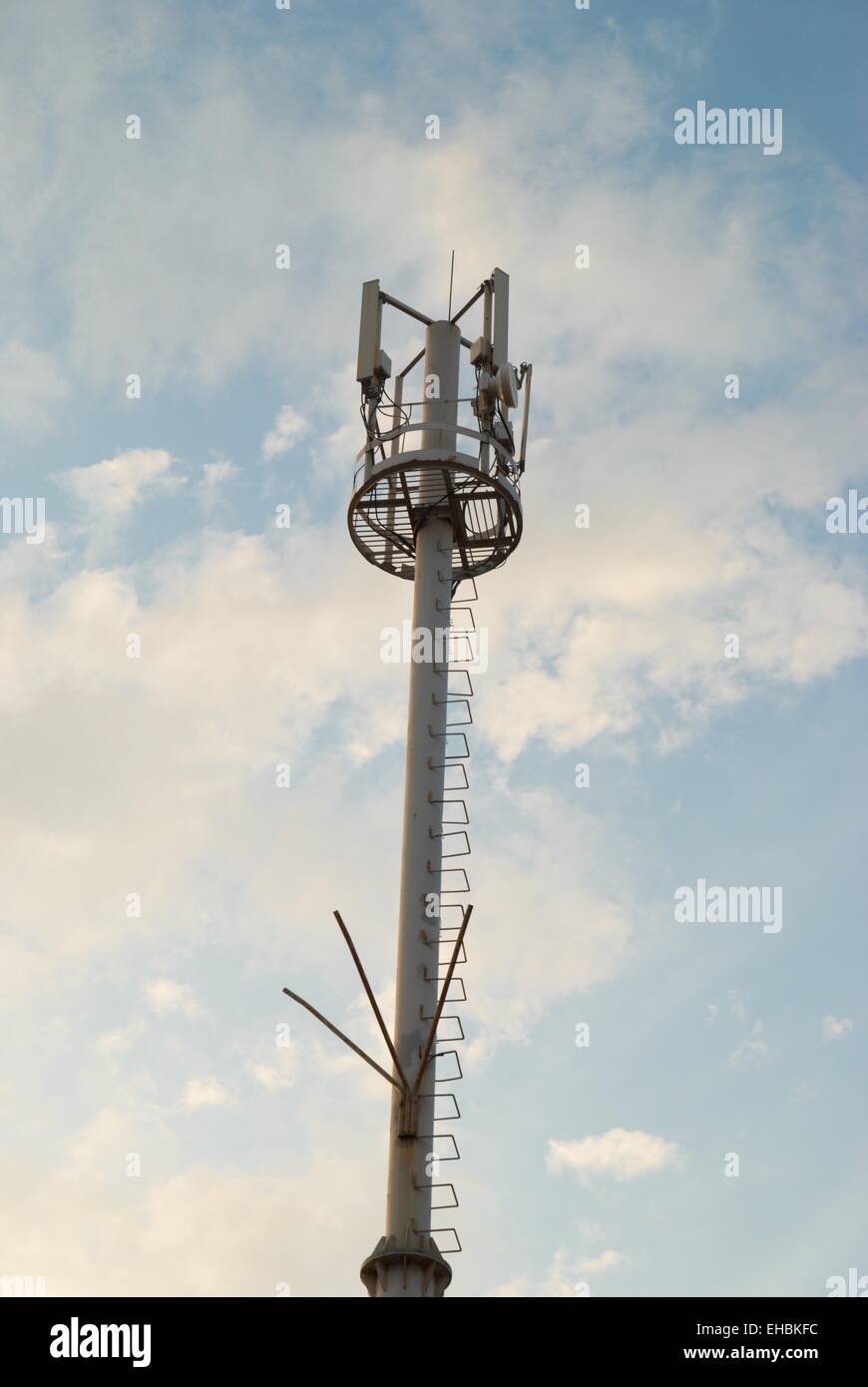 GSM antenna against the blue sky background Stock Photo - Alamy