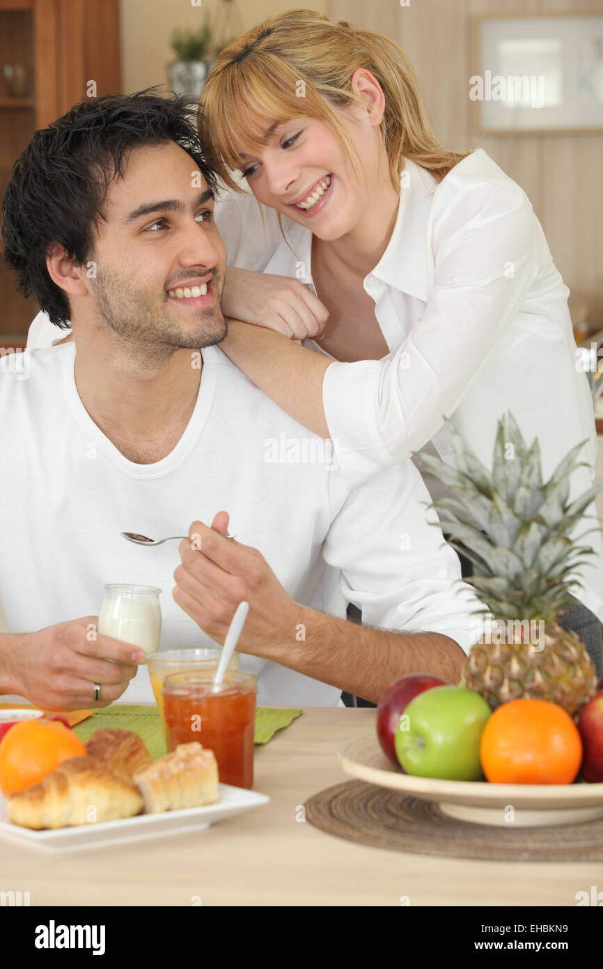 Couple having breakfast Stock Photo - Alamy