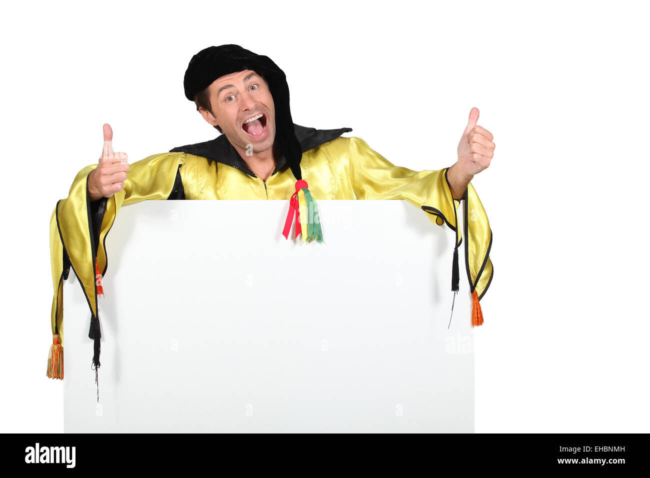 man dressed as a harlequin Stock Photo - Alamy
