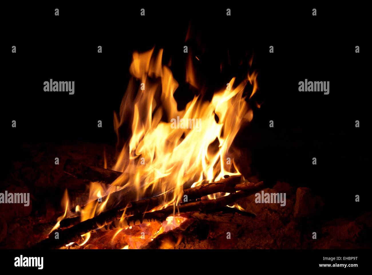 Red bright campfire with the black background Stock Photo - Alamy