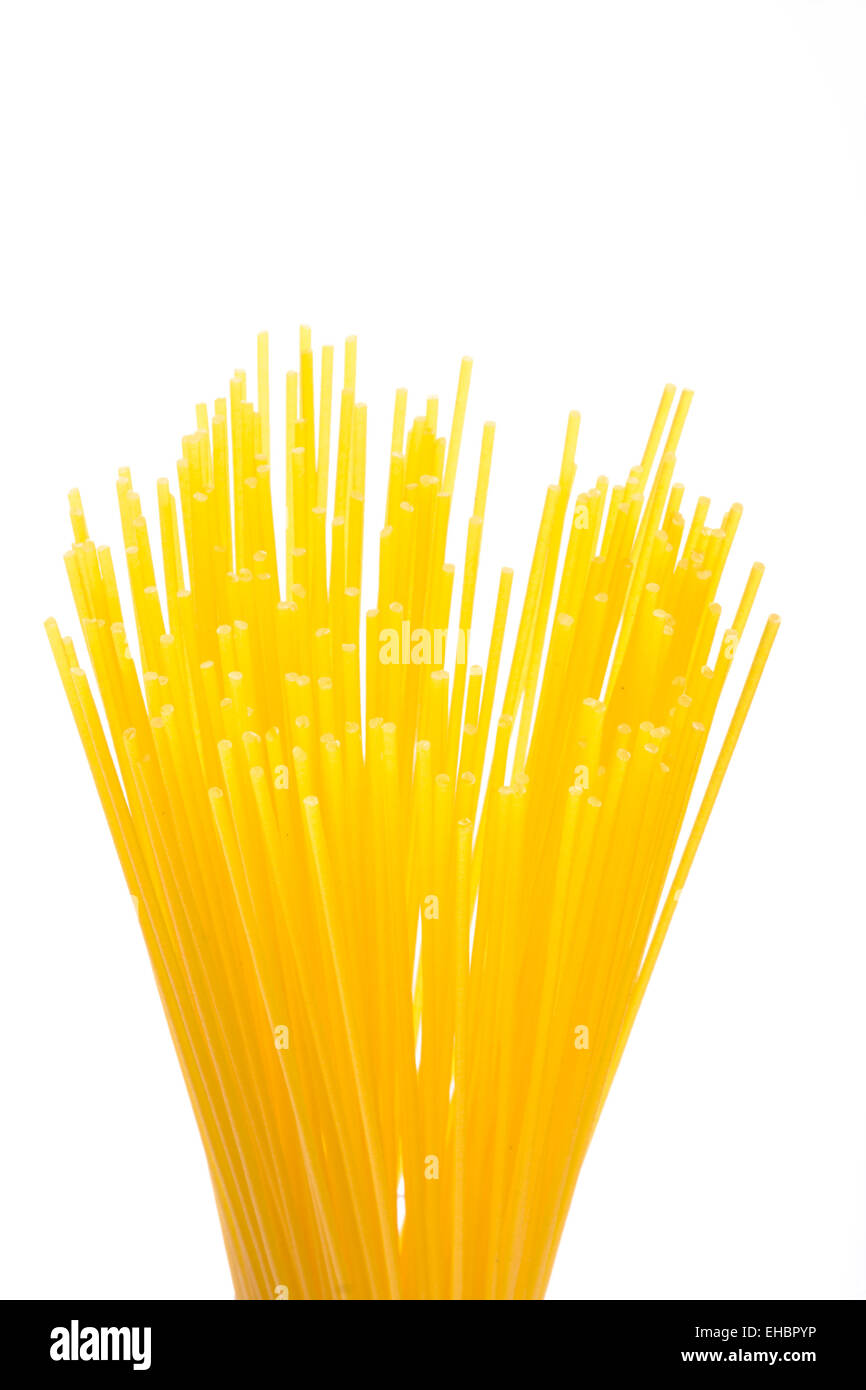 yellow spaghetti rays on white background Stock Photo - Alamy