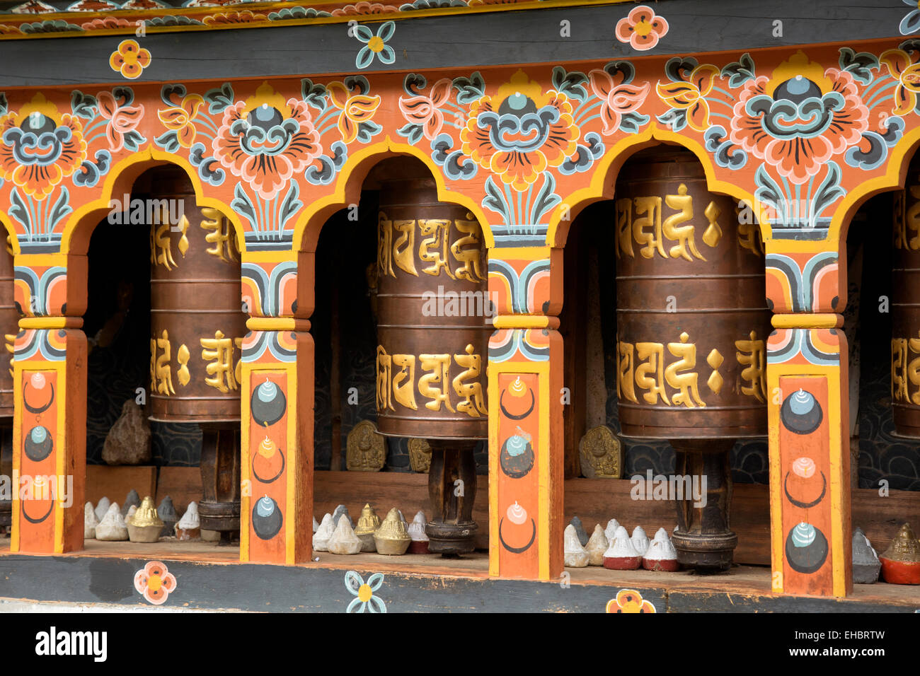 BU00307-00...BHUTAN - Prayer wheels on a chorten at the southern ...
