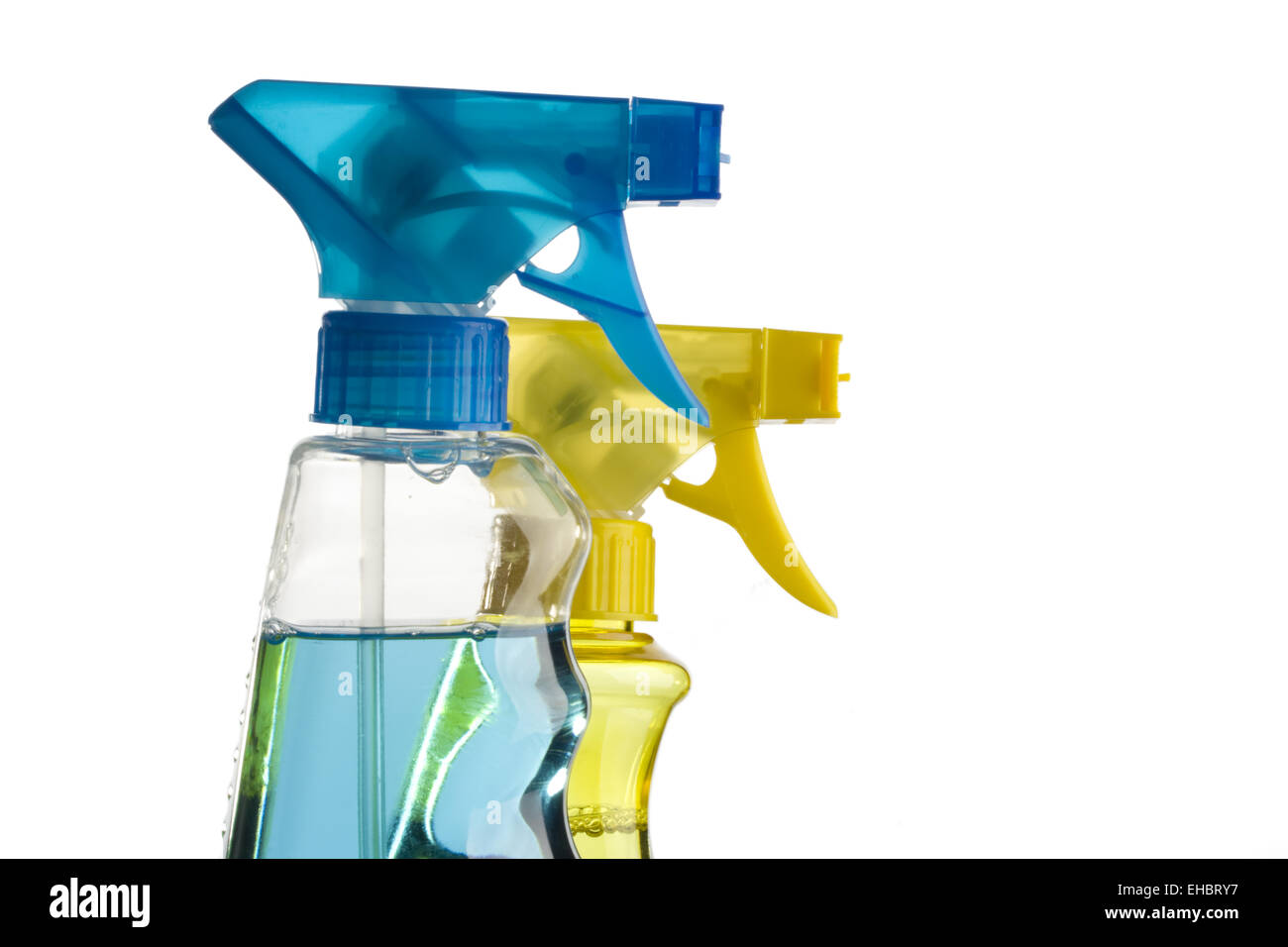 blue and yellow trigger spray bottles Stock Photo - Alamy