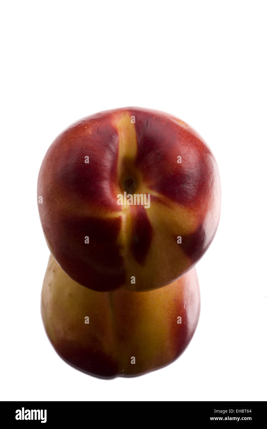 single nectarine on a mirror Stock Photo - Alamy