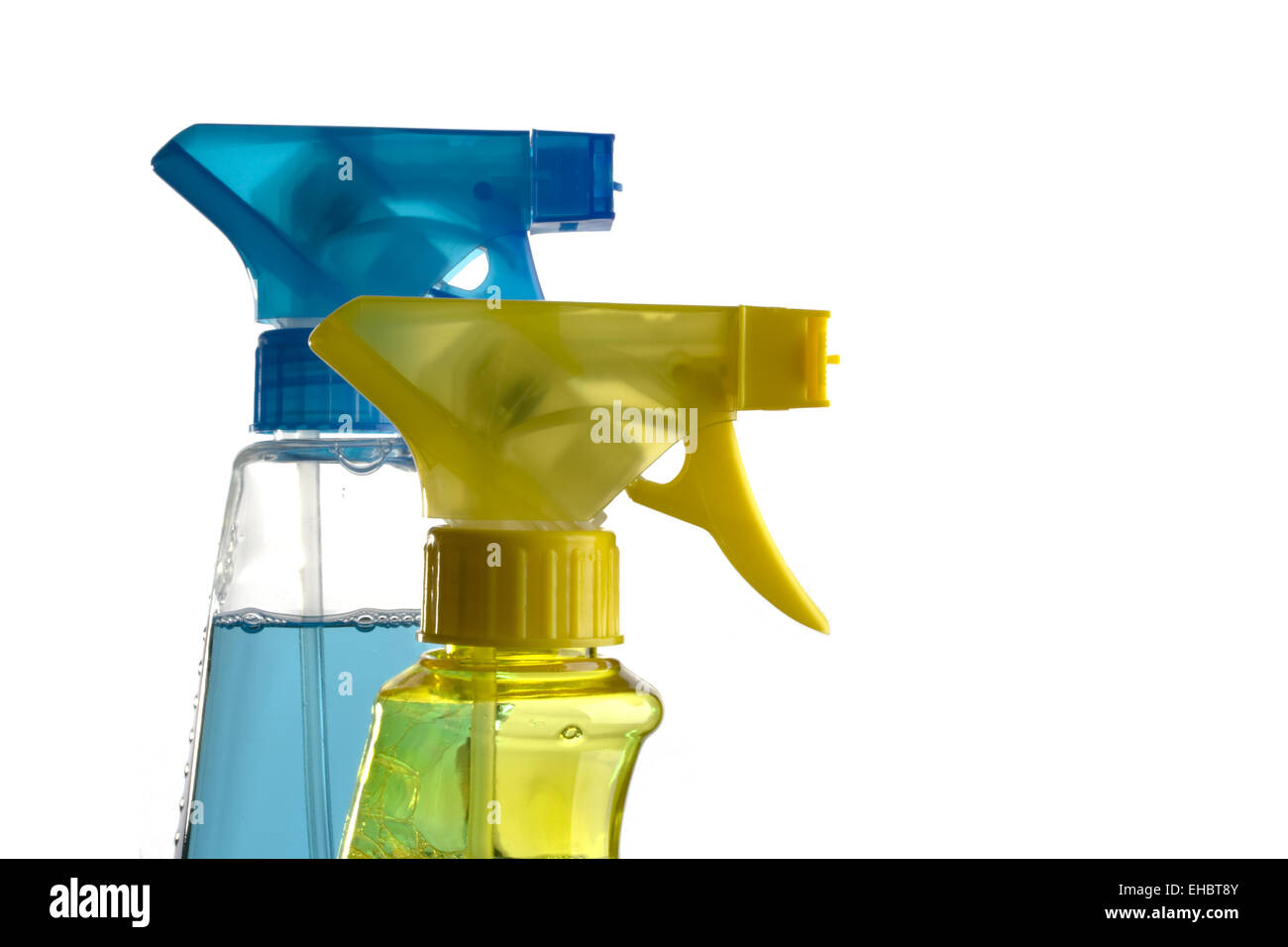 blue and yellow trigger spray bottles Stock Photo - Alamy