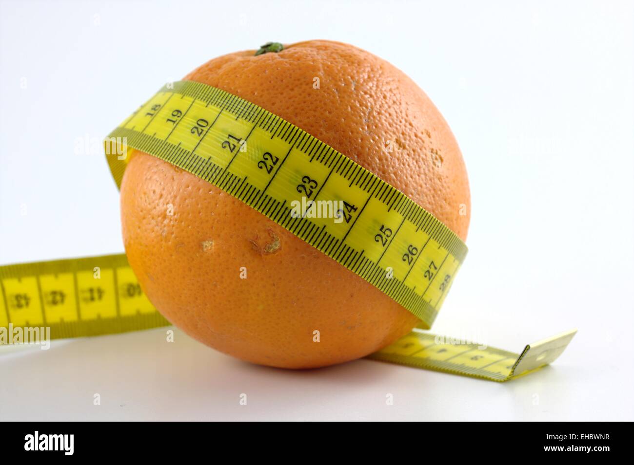 orange with measuring tape Stock Photo - Alamy