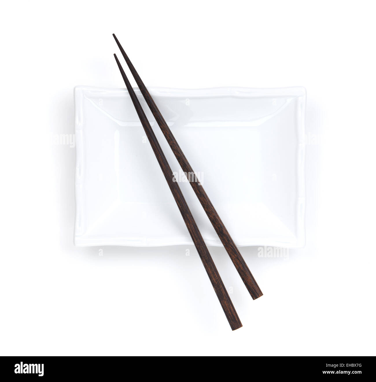 Empty plate and chopsticks. Isolated on white background Stock Photo ...