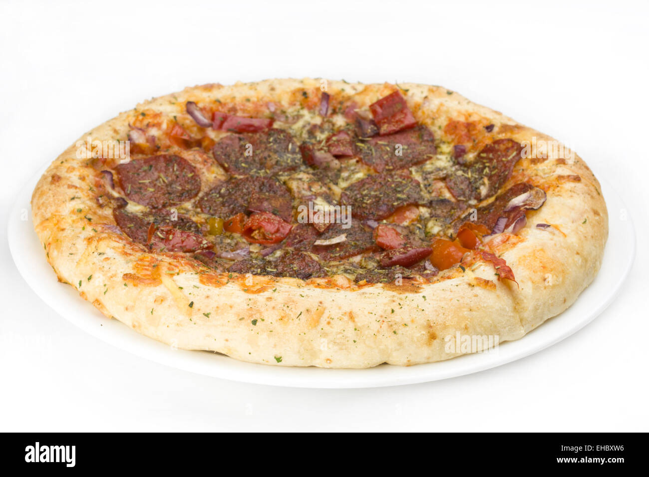pizza on a plate on white background Stock Photo - Alamy