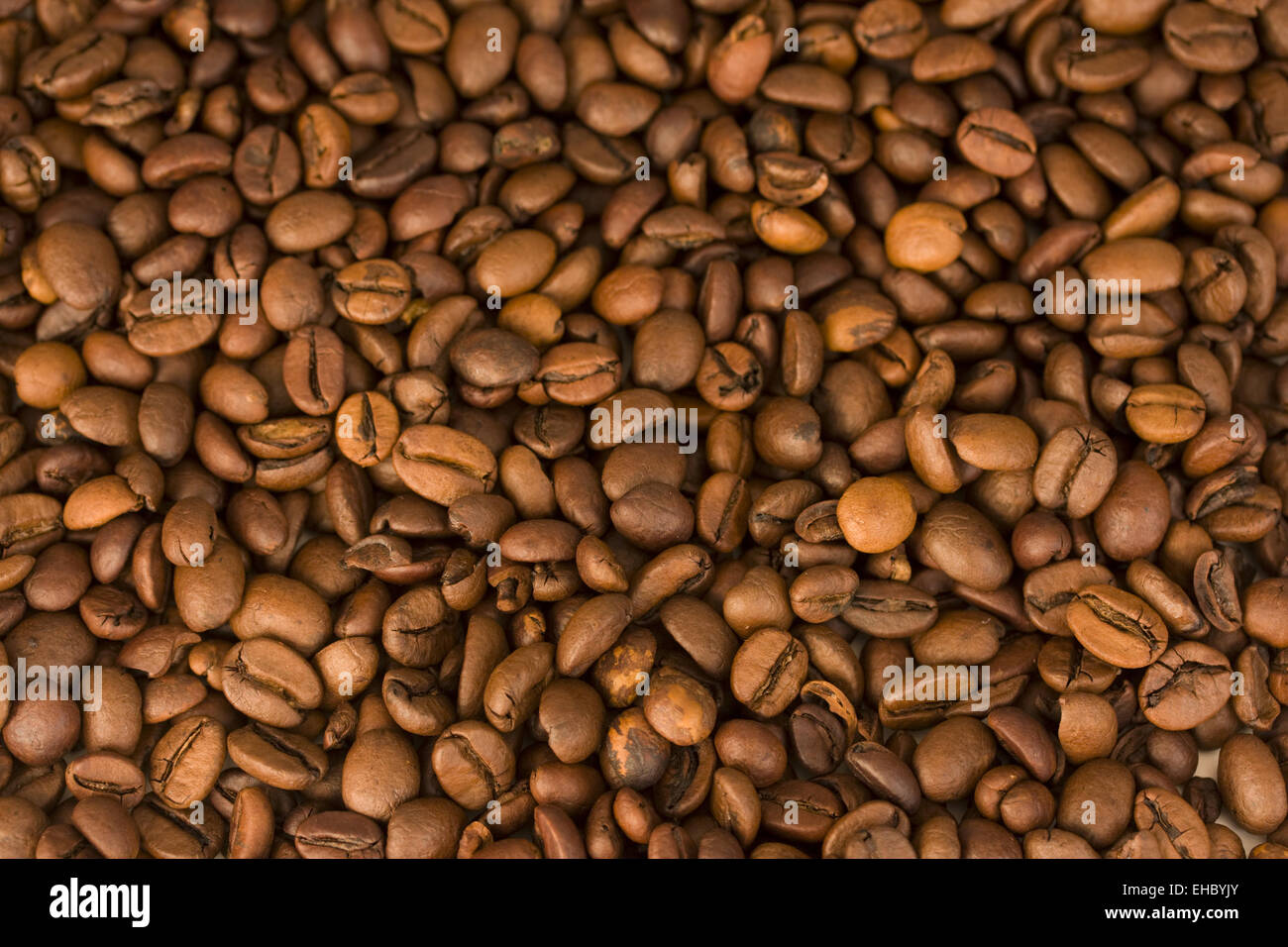 background of a lot of brown espresso beans Stock Photo - Alamy