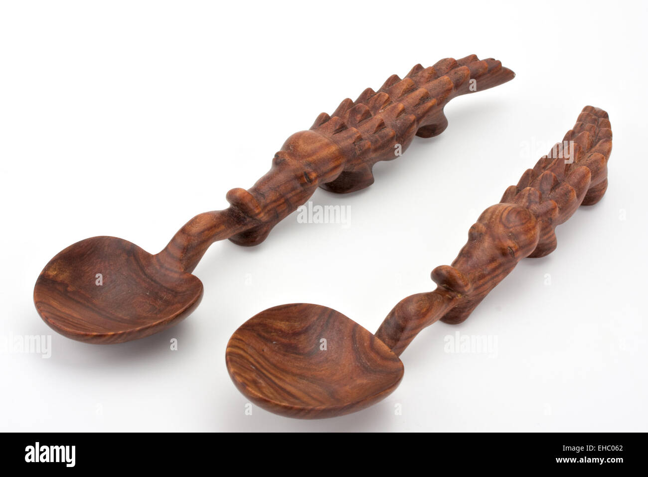 a carved spoon in the shape of a crocodile Stock Photo - Alamy