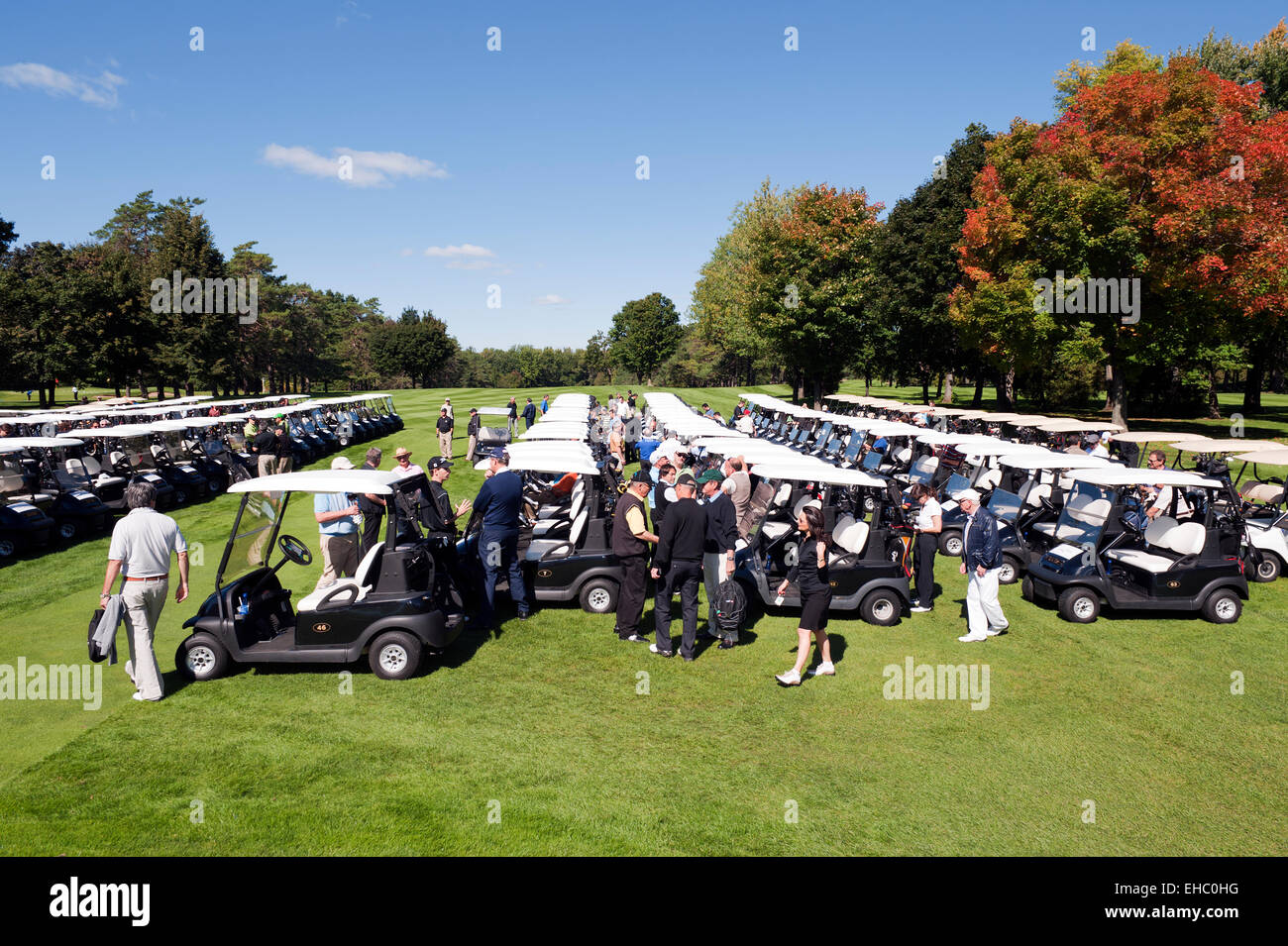 Players getting to their carts for the shotgun start at a corporate ...