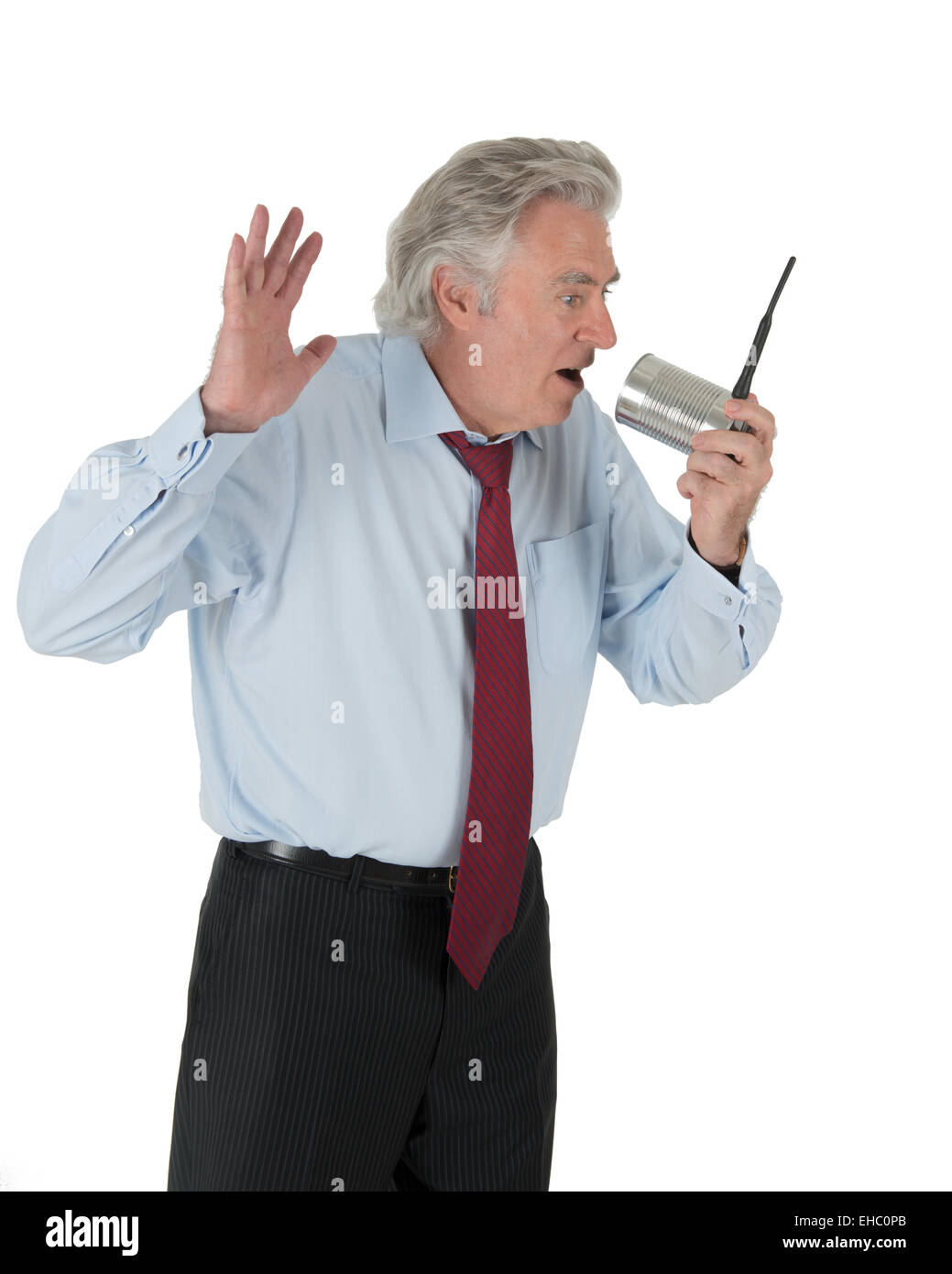 Business man talking into can with antenna Stock Photo - Alamy