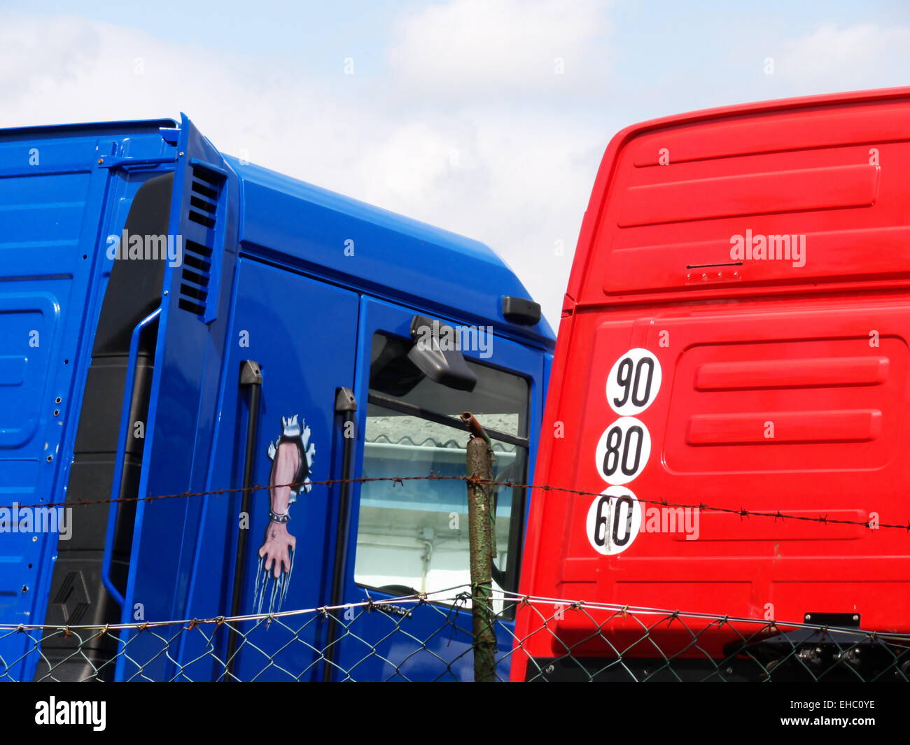 Red and blue trucks hi-res stock photography and images - Alamy