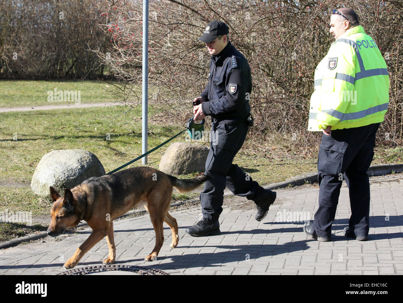 The police searchs with tracking dogs for an offender who is classified ...