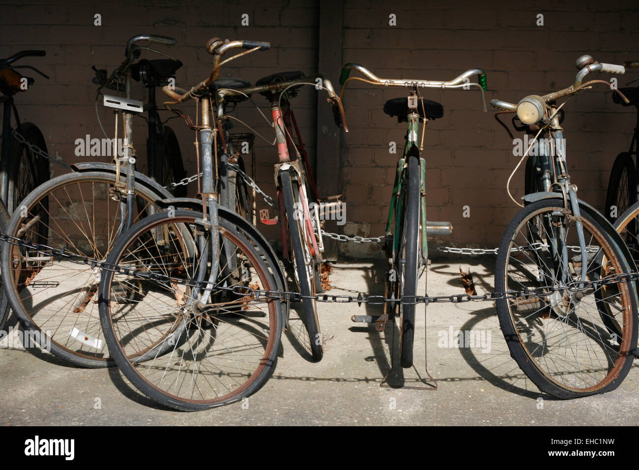 Row of old rusty vintage bikes Stock Photo - Alamy