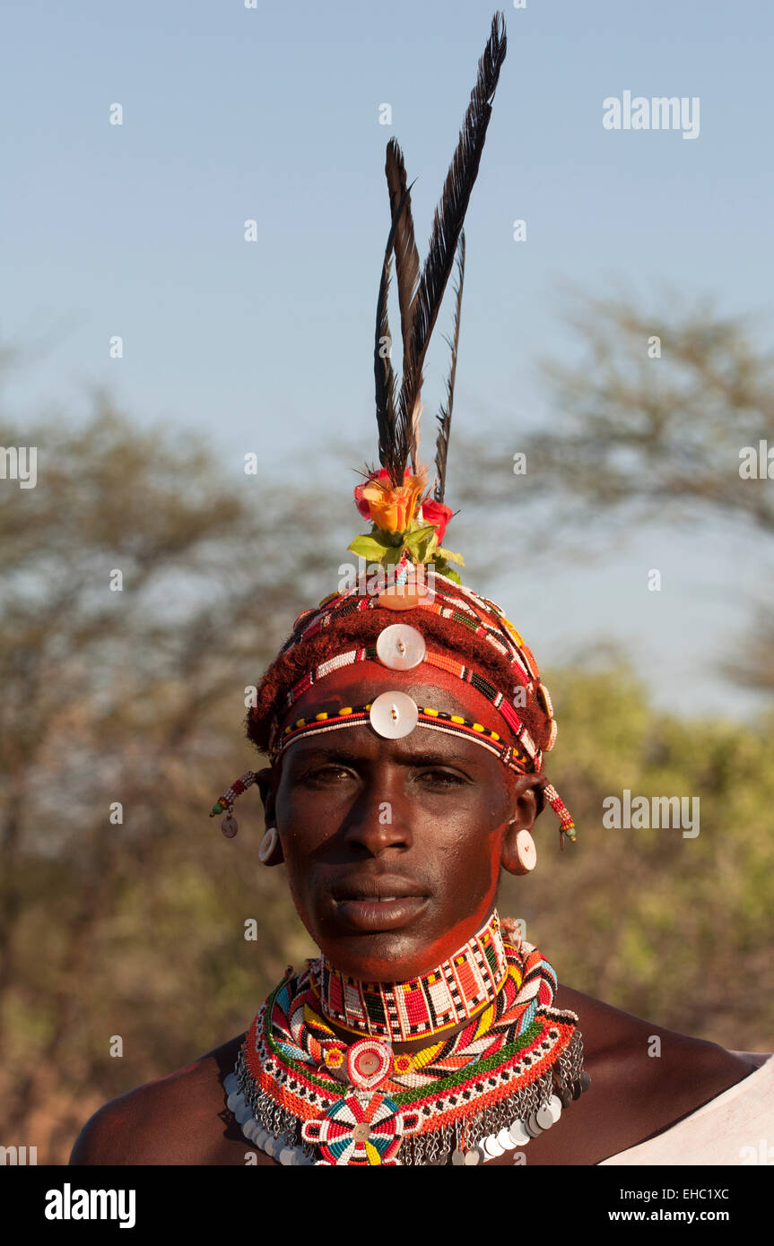 A Samburu Moran (warrior) decorated for a wedding ceremony, Archer's ...
