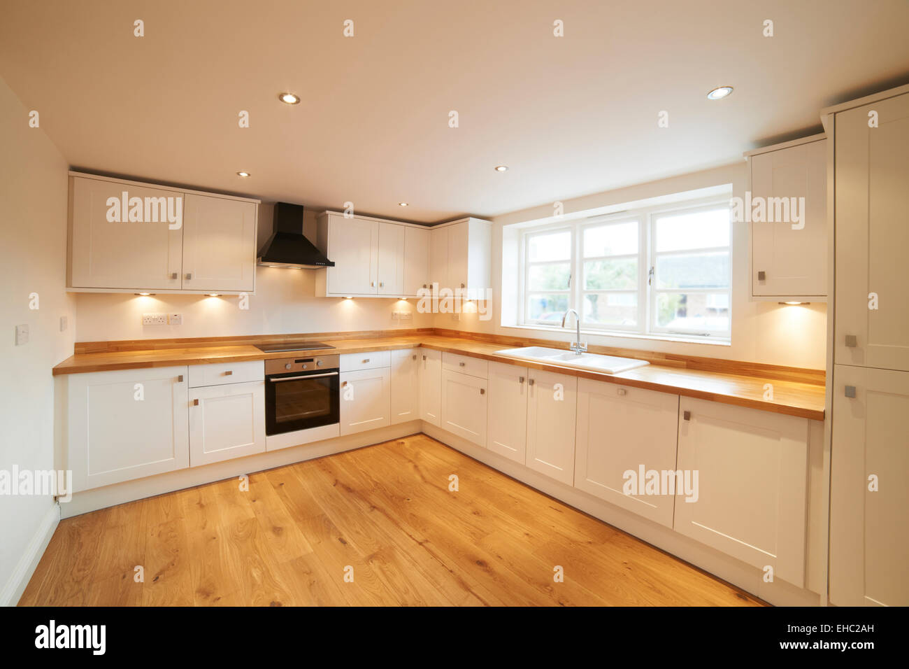 Beautiful Fitted Kitchen In Modern House Stock Photo - Alamy