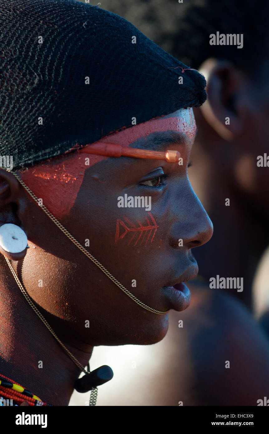 A Samburu Moran (warrior) with painted symbol on his cheek, Archer's ...
