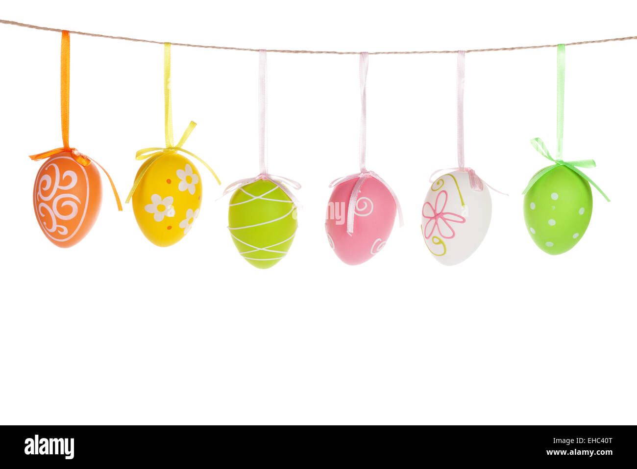 Colorful easter eggs hanging on rope. Isolated on white background ...