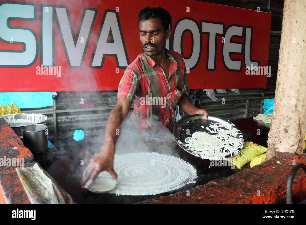 Cooking food at local restaurant Stock Photo - Alamy