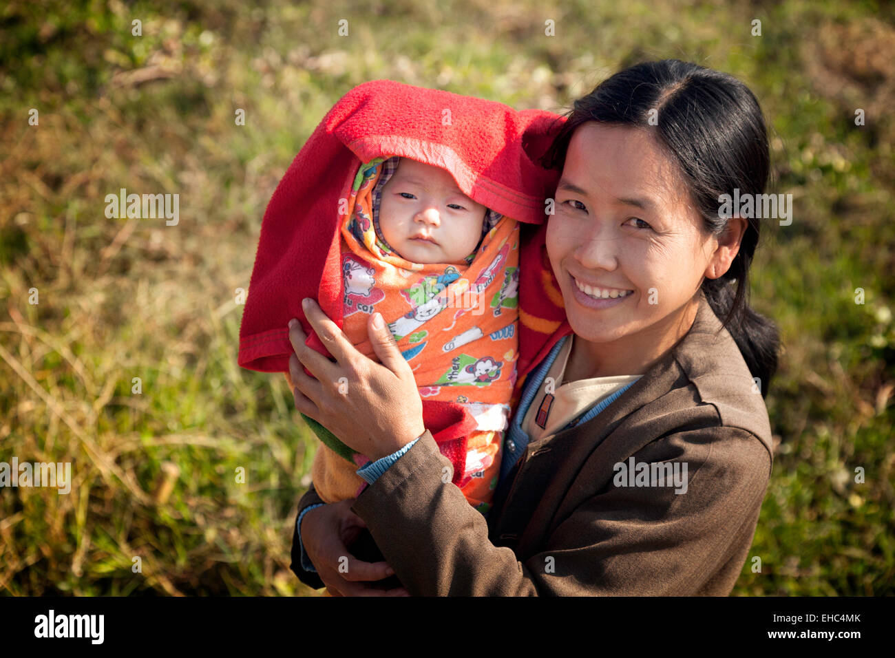 A Burmese mother with her baby child, Myanmar, ( Burma ), Asia Stock ...