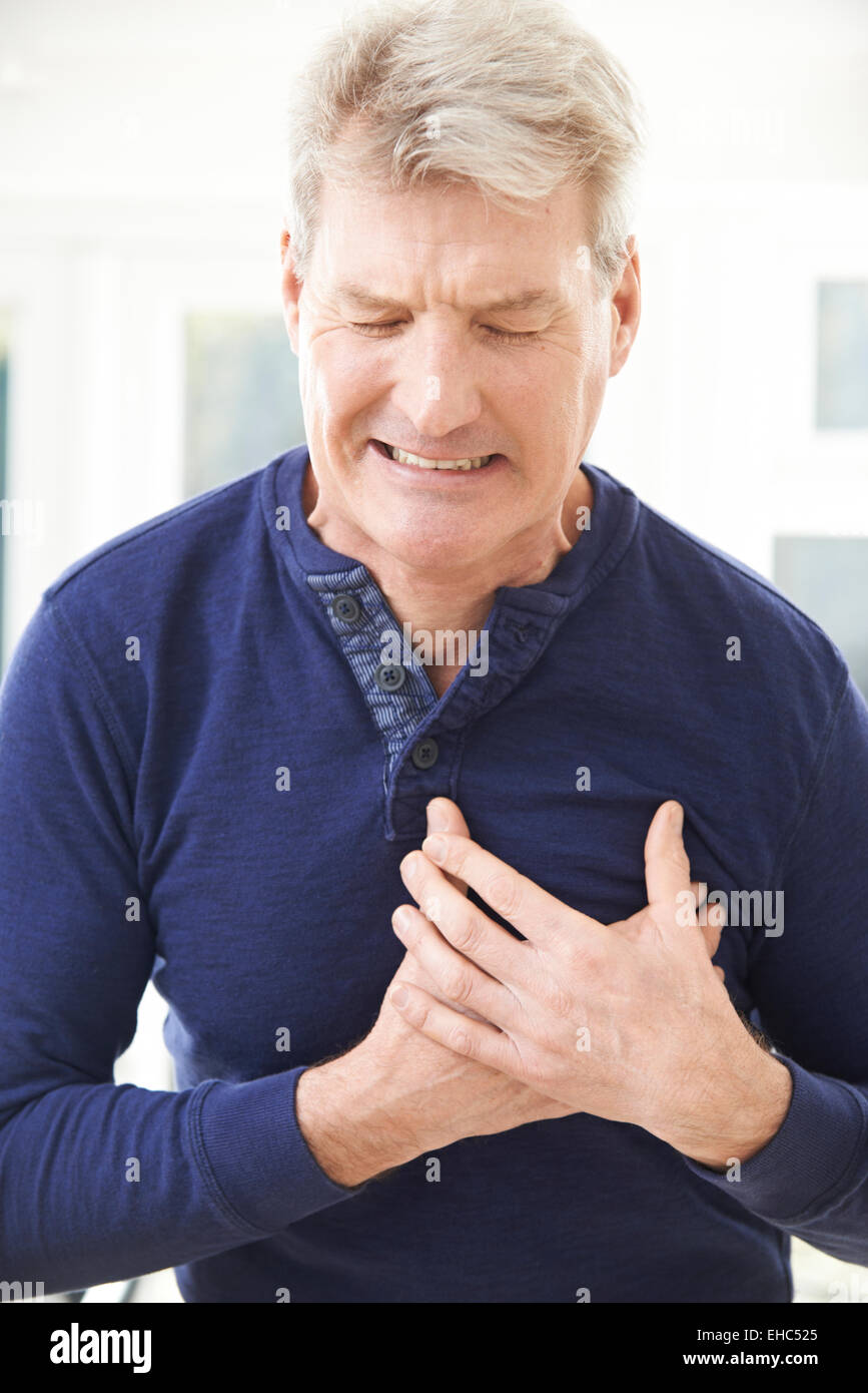 Caucasian man chest pain heart attack hi-res stock photography and ...