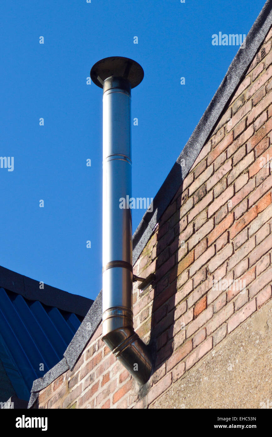 Stainless Steel Industrial Chimney on a Factory Wall, UK Stock Photo ...