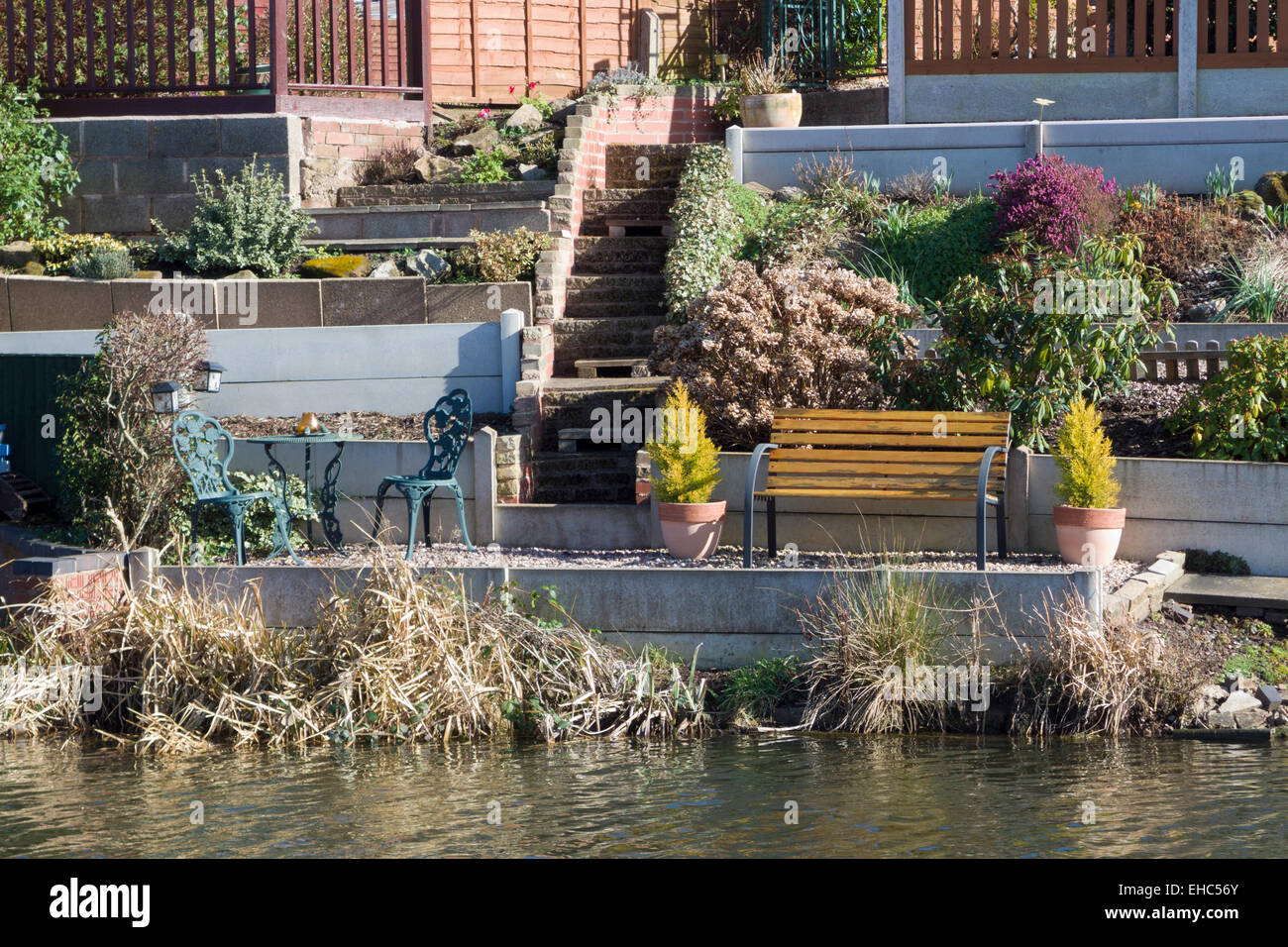 Umpqua River And Landscaping On Slope Retaining Wall Along