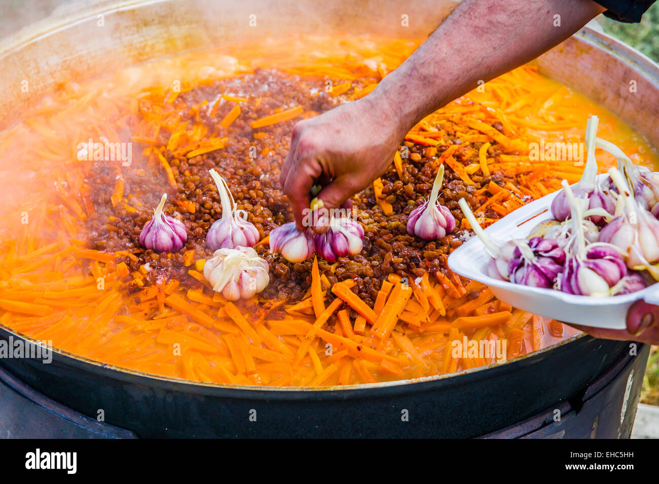 Preparation of mutton pilaf - Uzbek national meal of mutton, rice ...