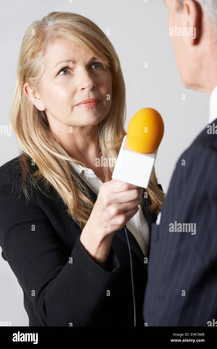 Female reporter interviewing woman hi-res stock photography and images ...