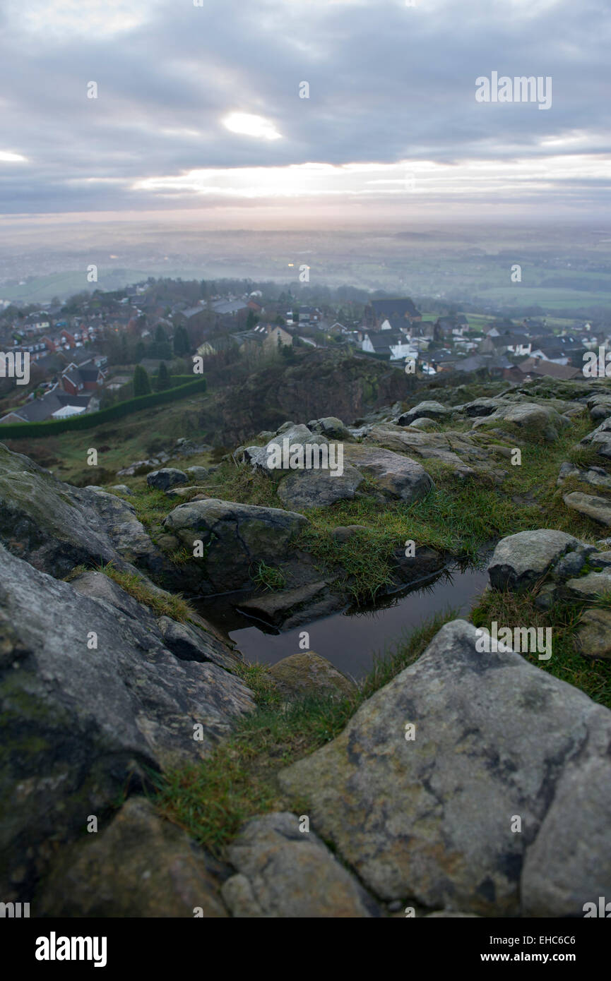 A view of a sunset over the Cheshire landscape from the top of Mow Cop ...