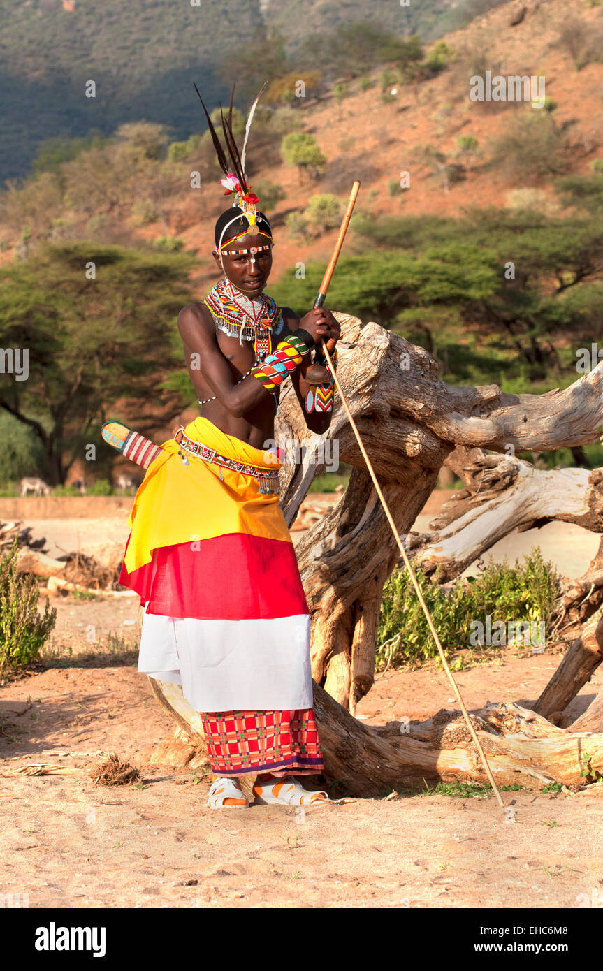 A Samburu Moran (warrior) fully dressed with colorful cloth, beaded ...