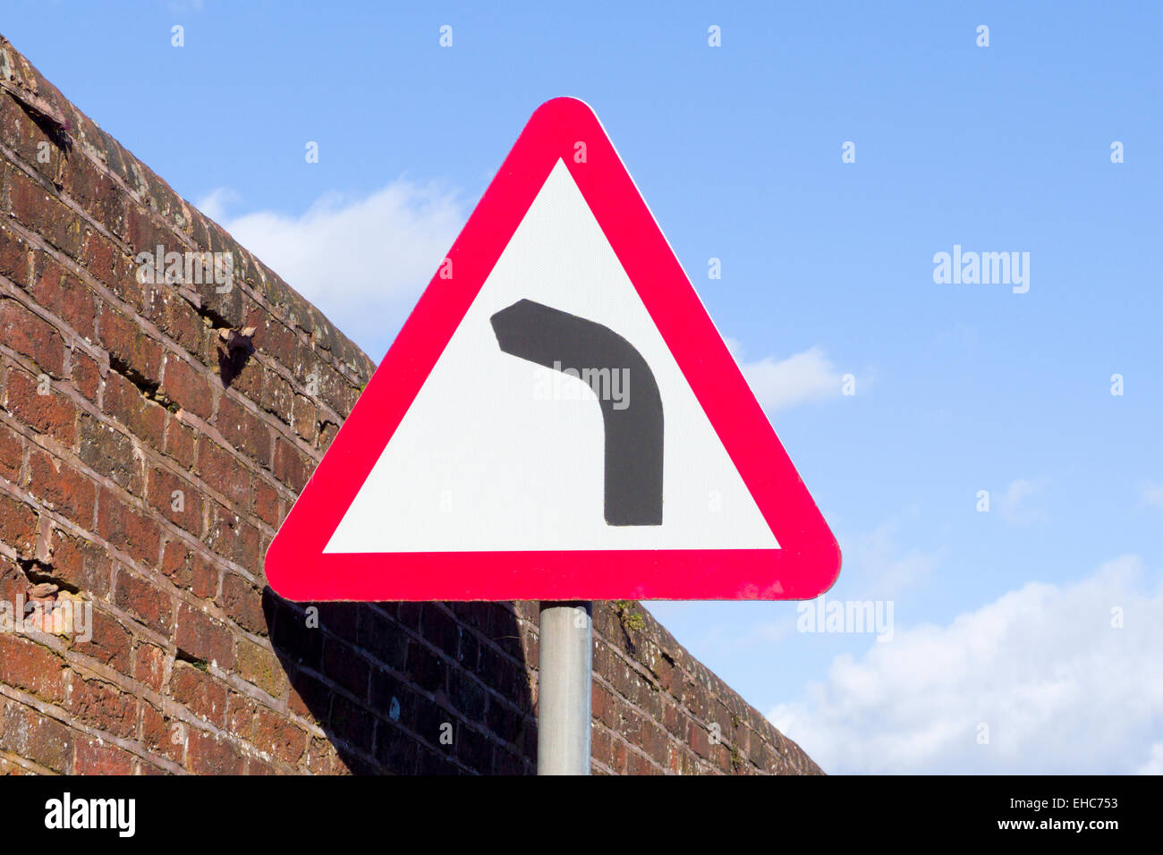 Left Hand Bend Hazard Road Sign, UK Stock Photo - Alamy