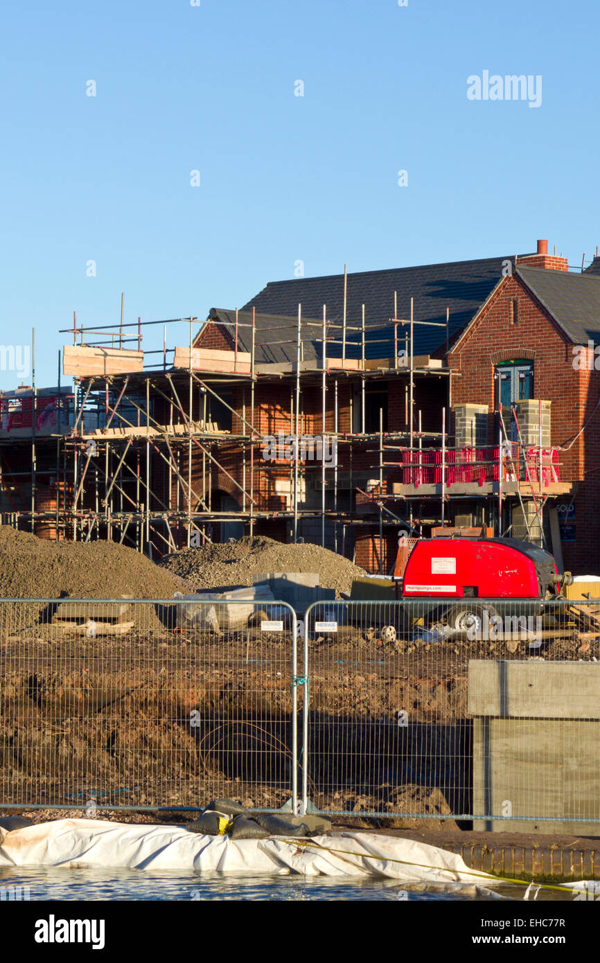 New Build Homes On a Construction Site, UK Stock Photo - Alamy