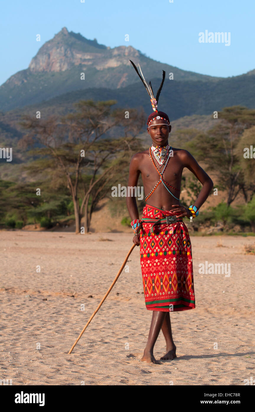 A Samburu Moran (warrior) fully dressed with red cloth, beaded ...