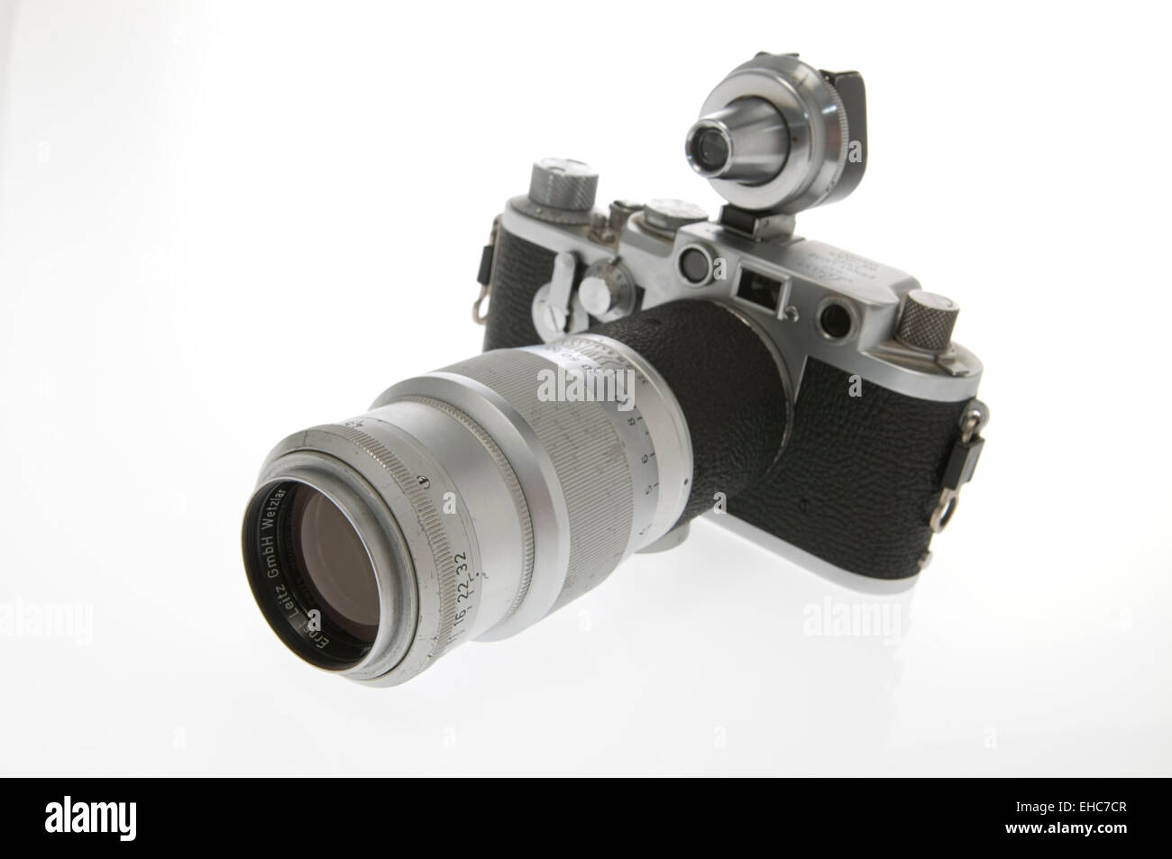 Old leica photo camera with 135mm tele lens Stock Photo - Alamy
