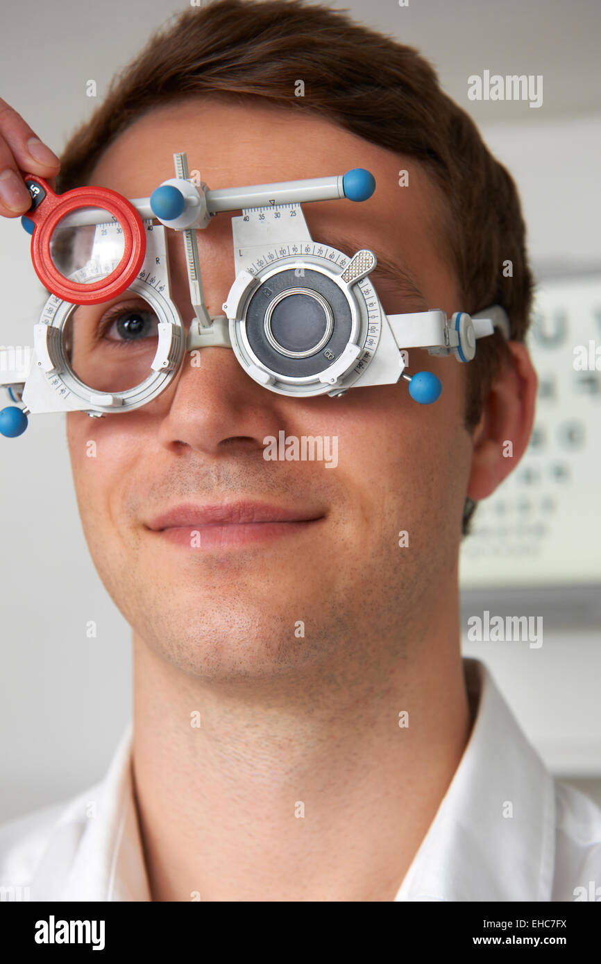 Man Having Sight Test At Optometrist Stock Photo - Alamy
