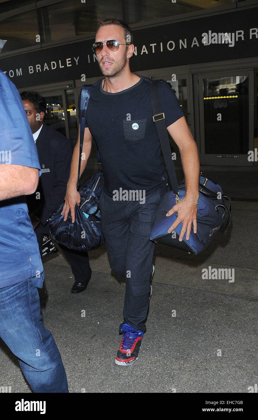 Coldplay frontman Chris Martin arrives at Los Angeles International ...